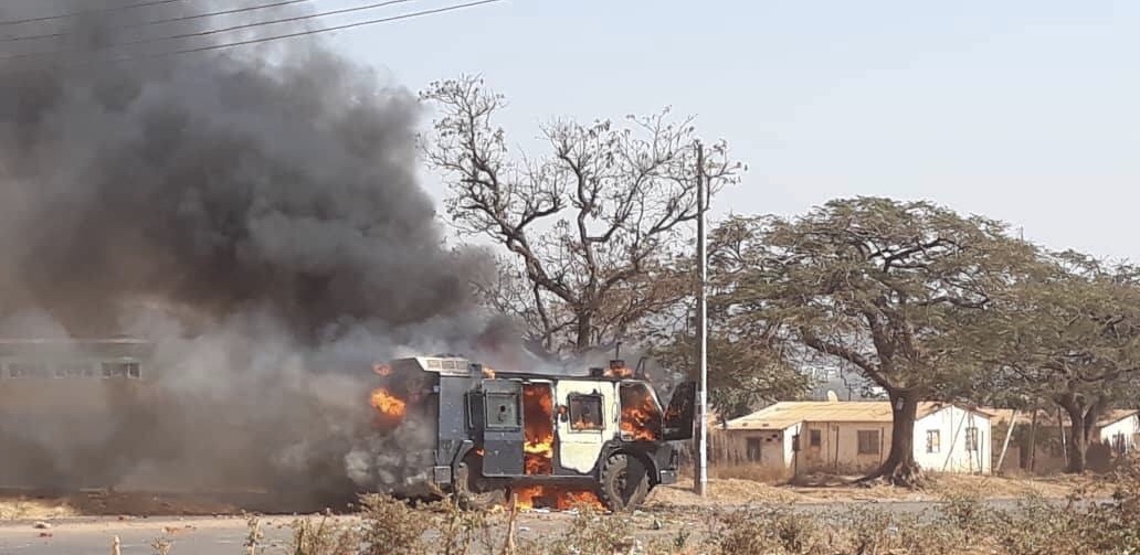 Malawi protests descend into chaos, police armoured vehicle set ablaze ...