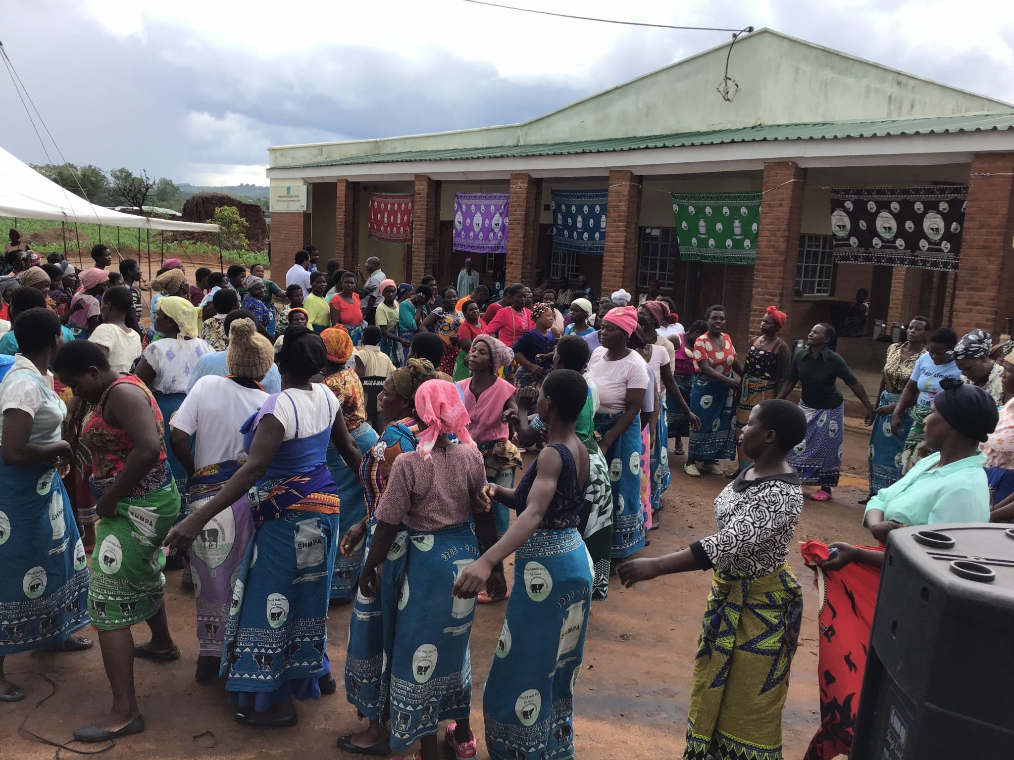 2 agricultural cooperatives presented with trucks under ...