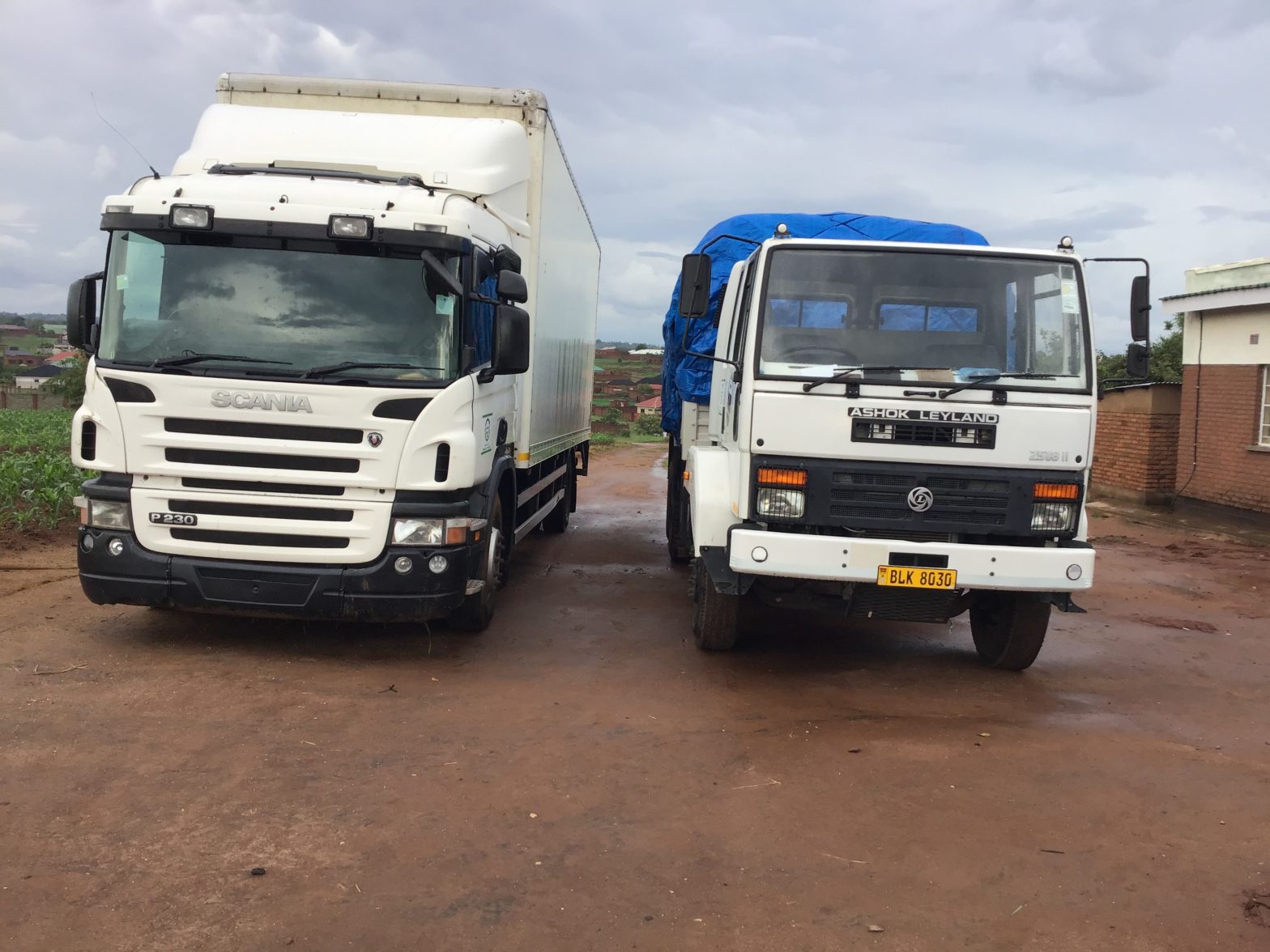 2 agricultural cooperatives presented with trucks under ...